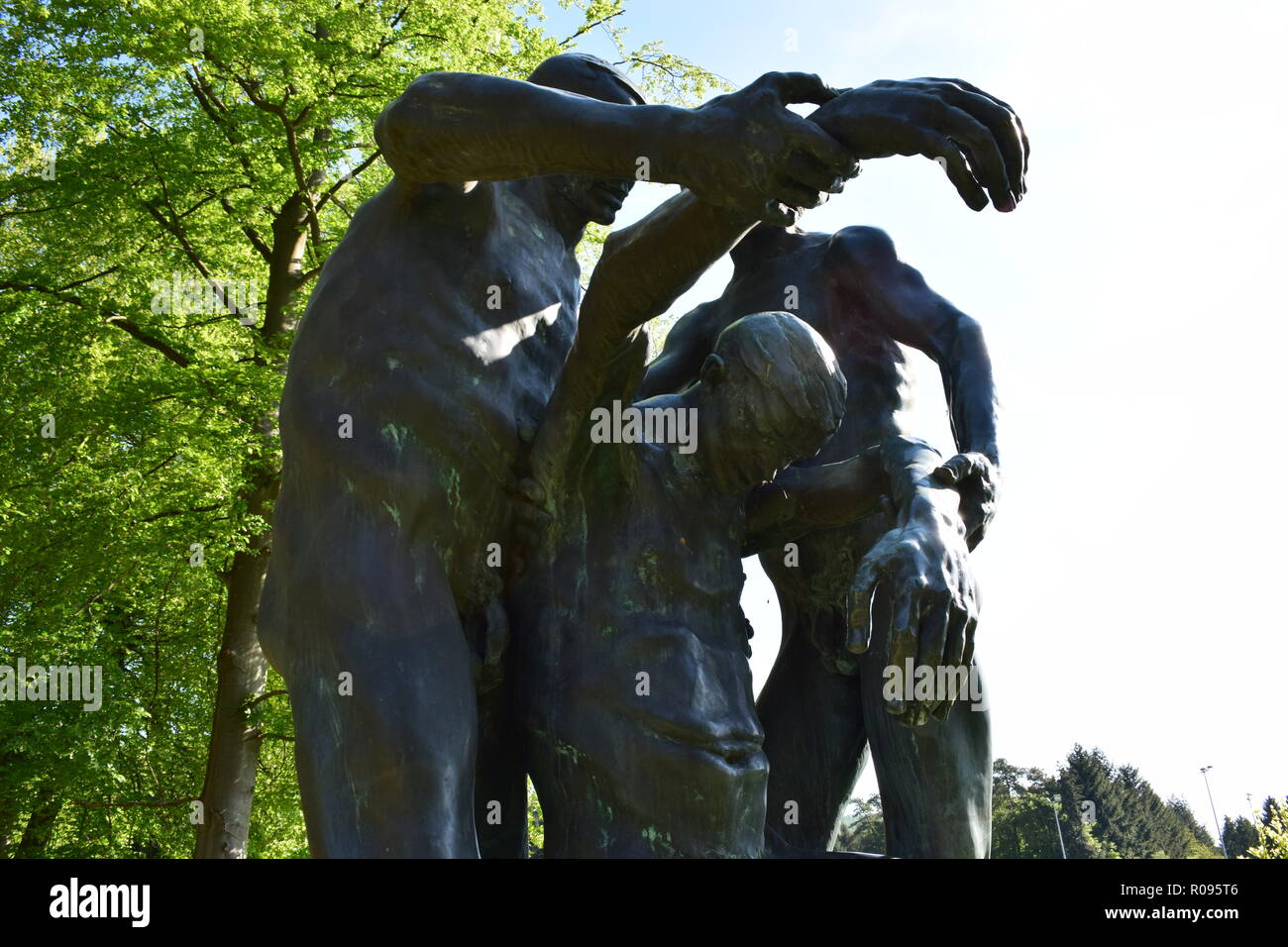 A bronze statue in the War War 2 military Cemetery in Reimsbach depicts ...