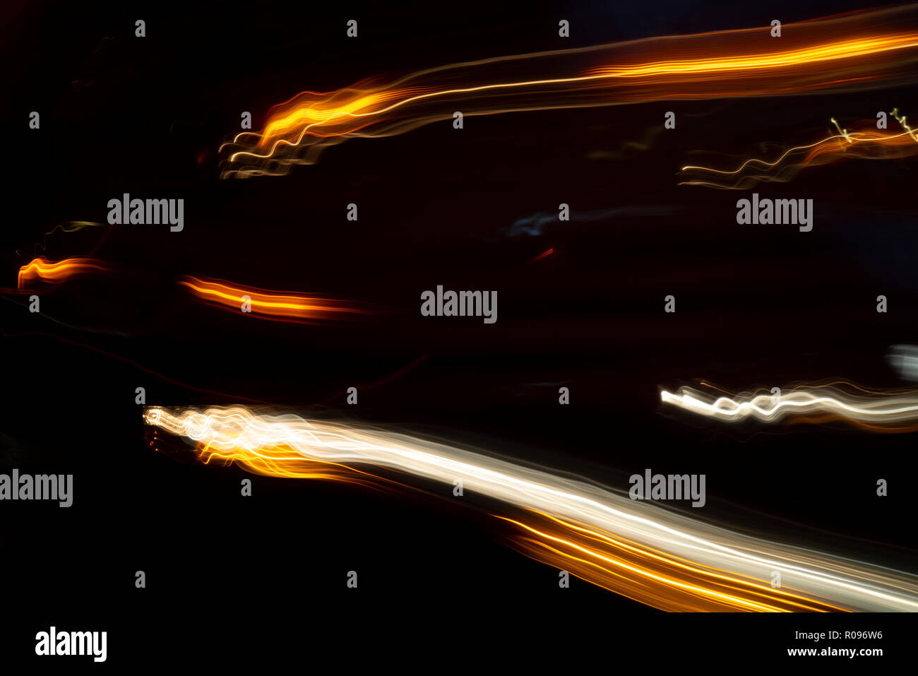 Light lines of car headlights Stock Photo - Alamy