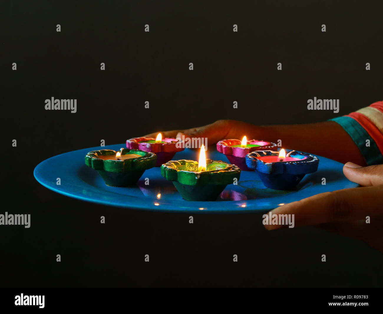 Celebrating the festival of lights Stock Photo - Alamy