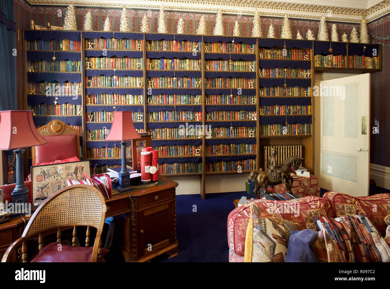 Book shelves full of collectors books in the studyThe Hall at Abbey-Cwm ...