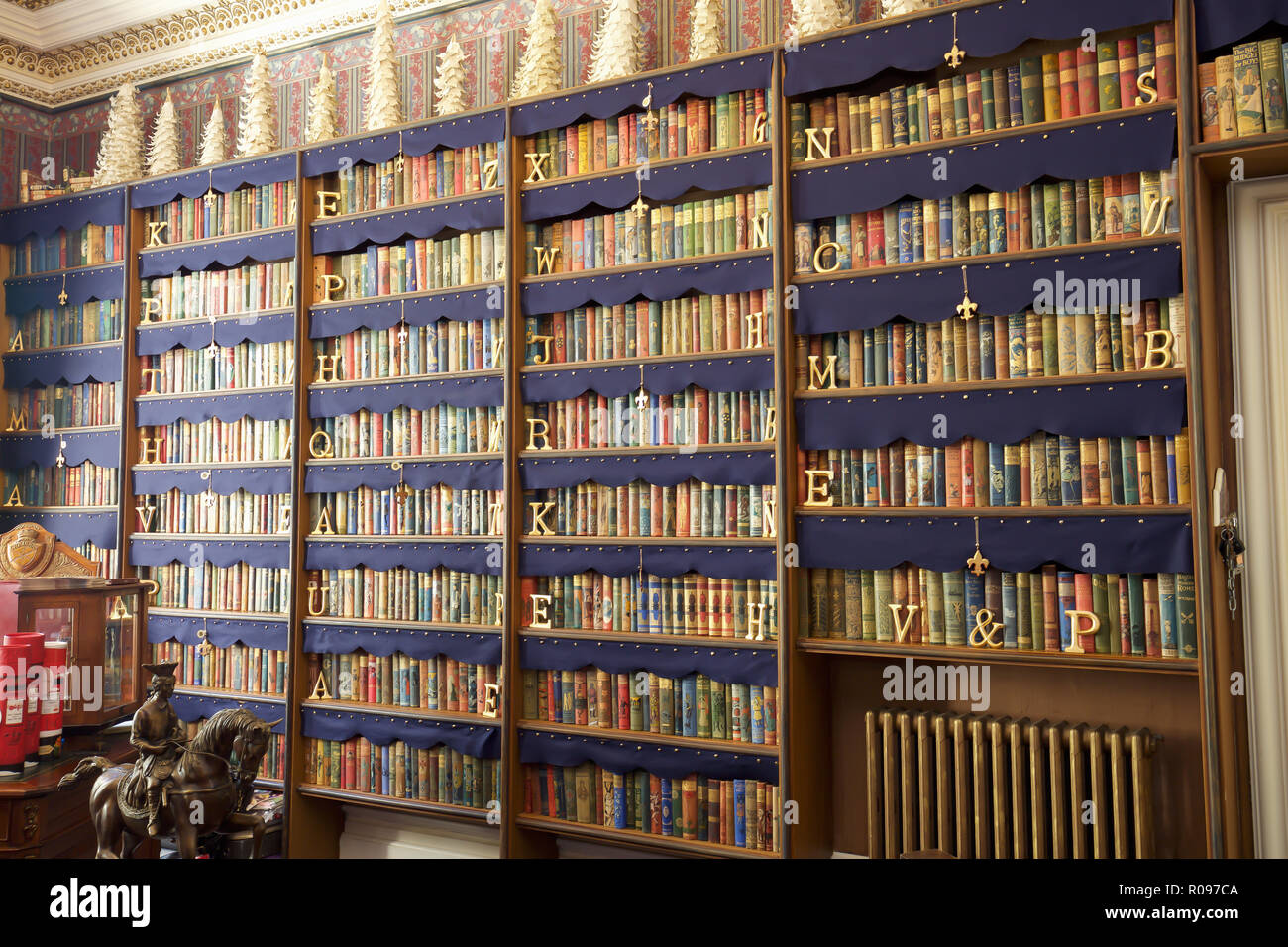 Book shelves full of collectors books in the studyThe Hall at Abbey-Cwm ...