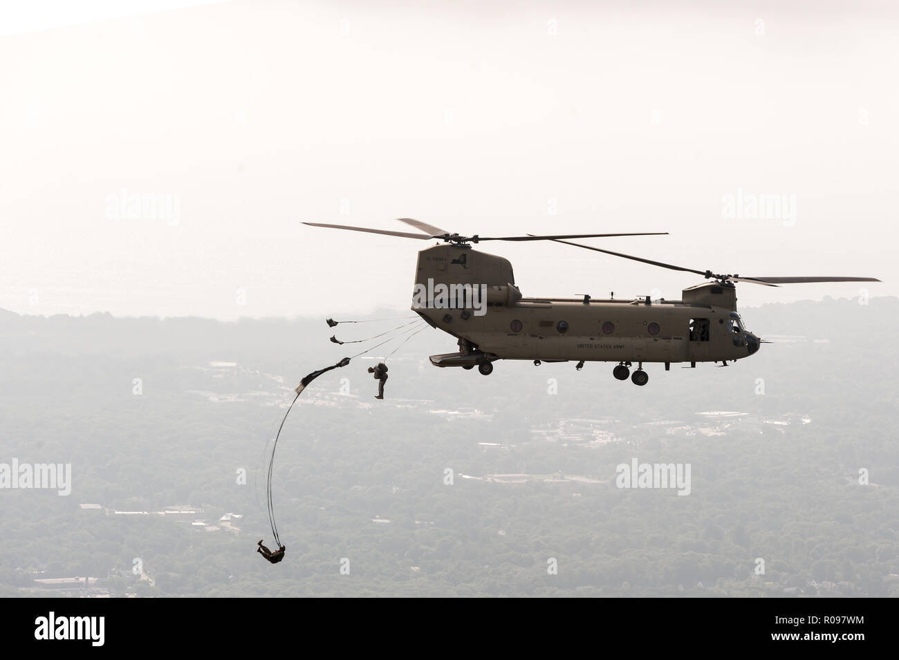 Paratroopers jumping out of a Chinook helicopter at the 2016 Leapfest ...