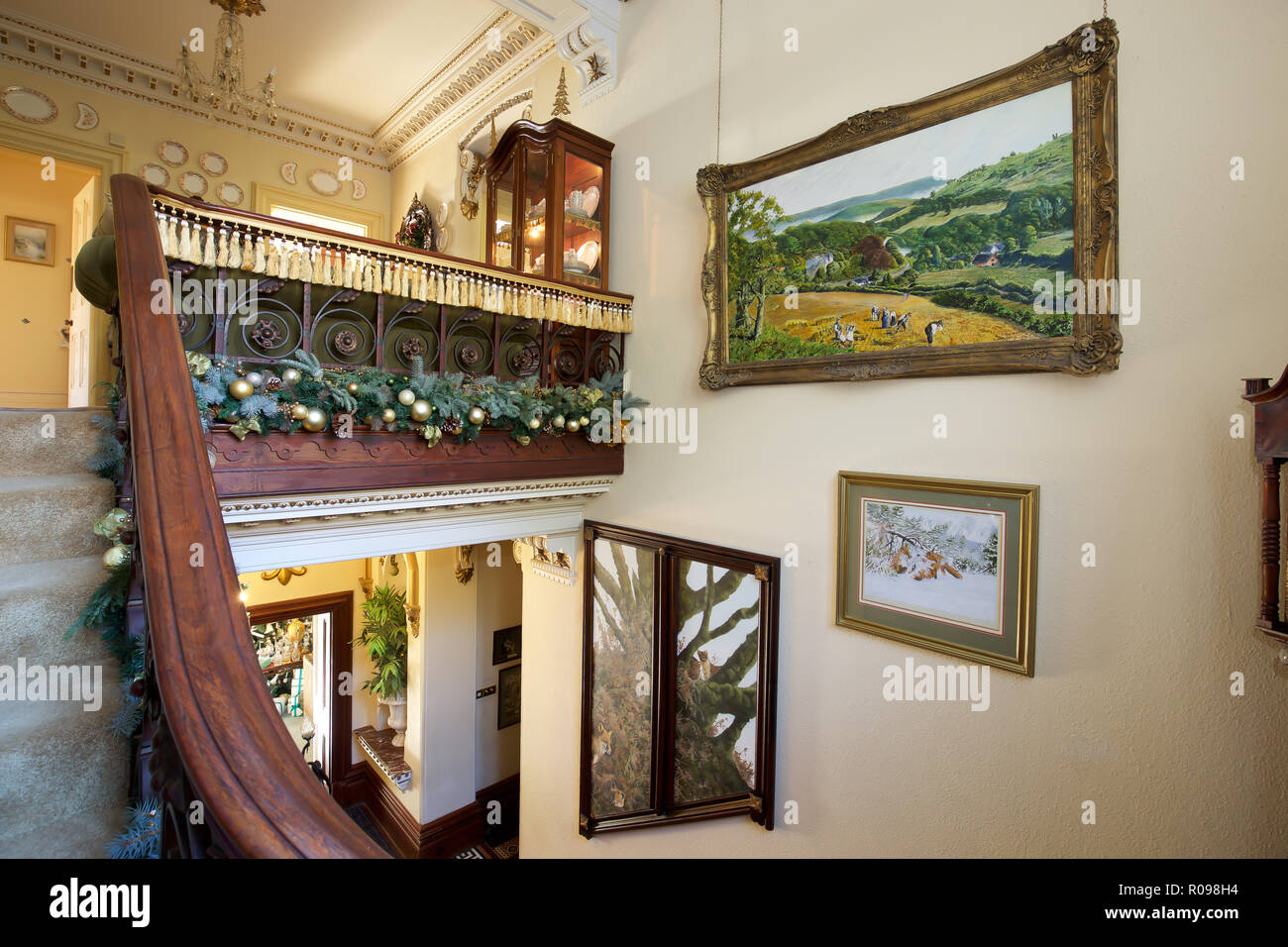 Staircase and hallway in The Hall at Abbey-Cwm-Hir Stock Photo - Alamy