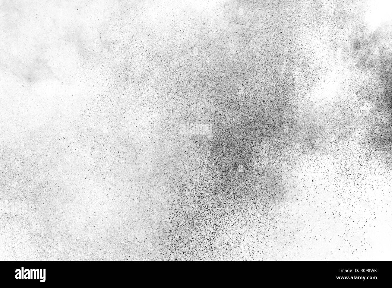 Black particles explosion isolated on white background. Abstract dust ...