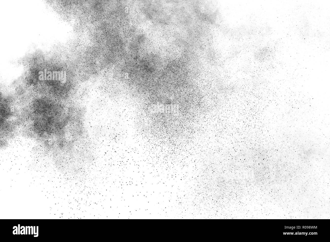 Black particles explosion isolated on white background. Abstract dust ...