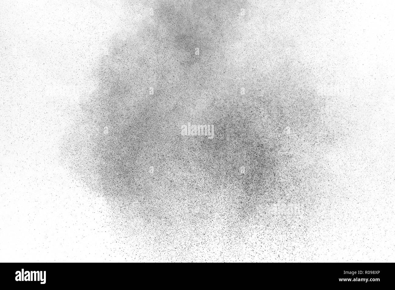 Black particles explosion isolated on white background. Abstract dust ...