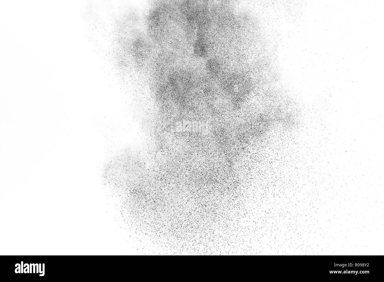 Black particles explosion isolated on white background. Abstract dust ...