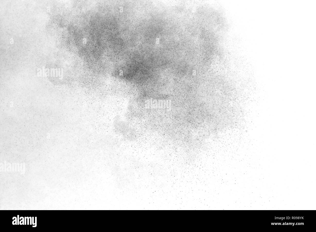 Black particles explosion isolated on white background. Abstract dust ...