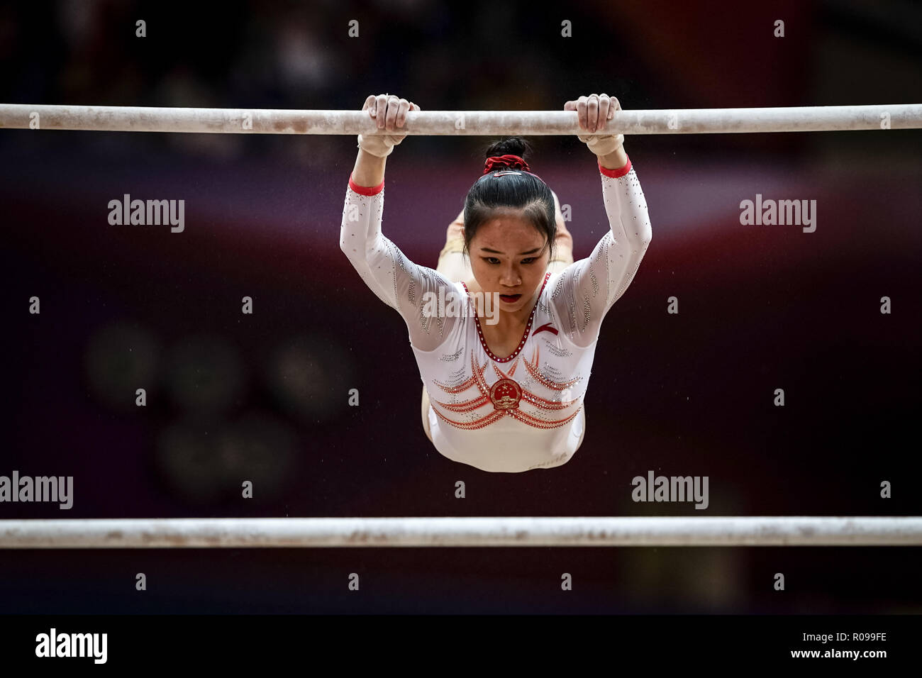 Doha, Qatar. November 2, 2018: Huan Luo of China during Uneven Bars for ...