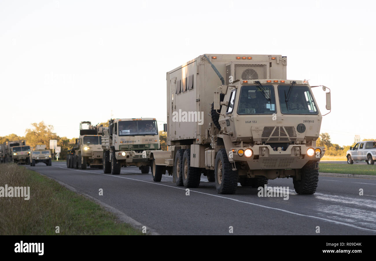 United States Army convoy carries troops and supplies to the U.S ...