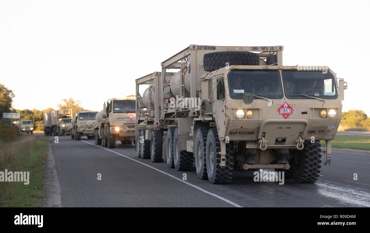 United States Army convoy carries troops and supplies to the U.S ...
