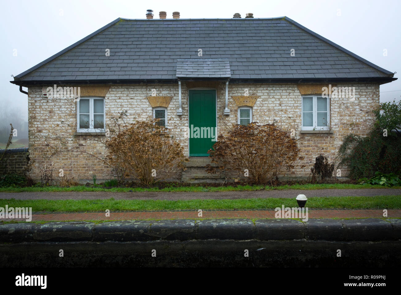 Lock keeper's cottage on the Grand Union Canal heading north early ...
