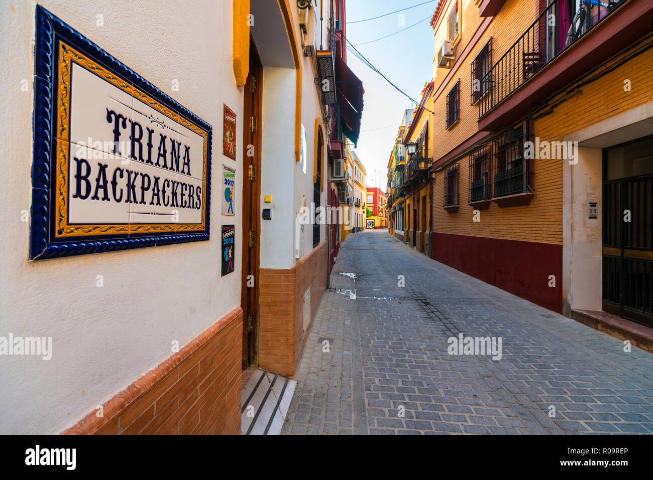 Old alley of the vibrant quarter of Triana, a neighborhood famous for ...