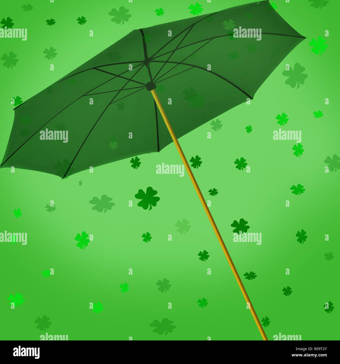 St. Patrick's day graphic of green umbrella with floating shamrocks ...