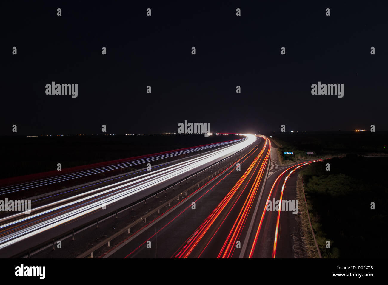 Light trails on the highway background Stock Photo - Alamy