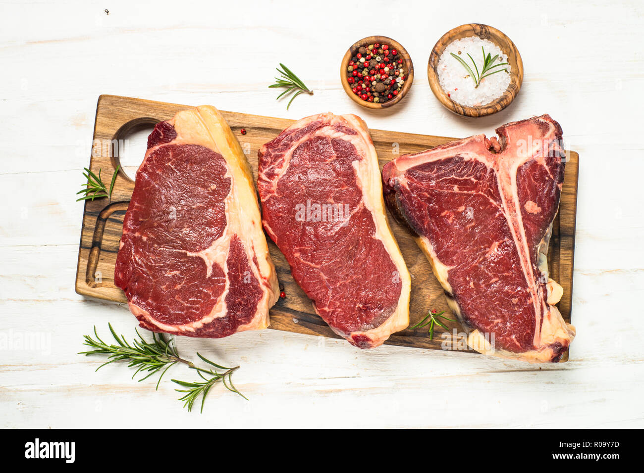 Raw meat beef steak. Black angus prime meat set - ribeye, striploin, t ...