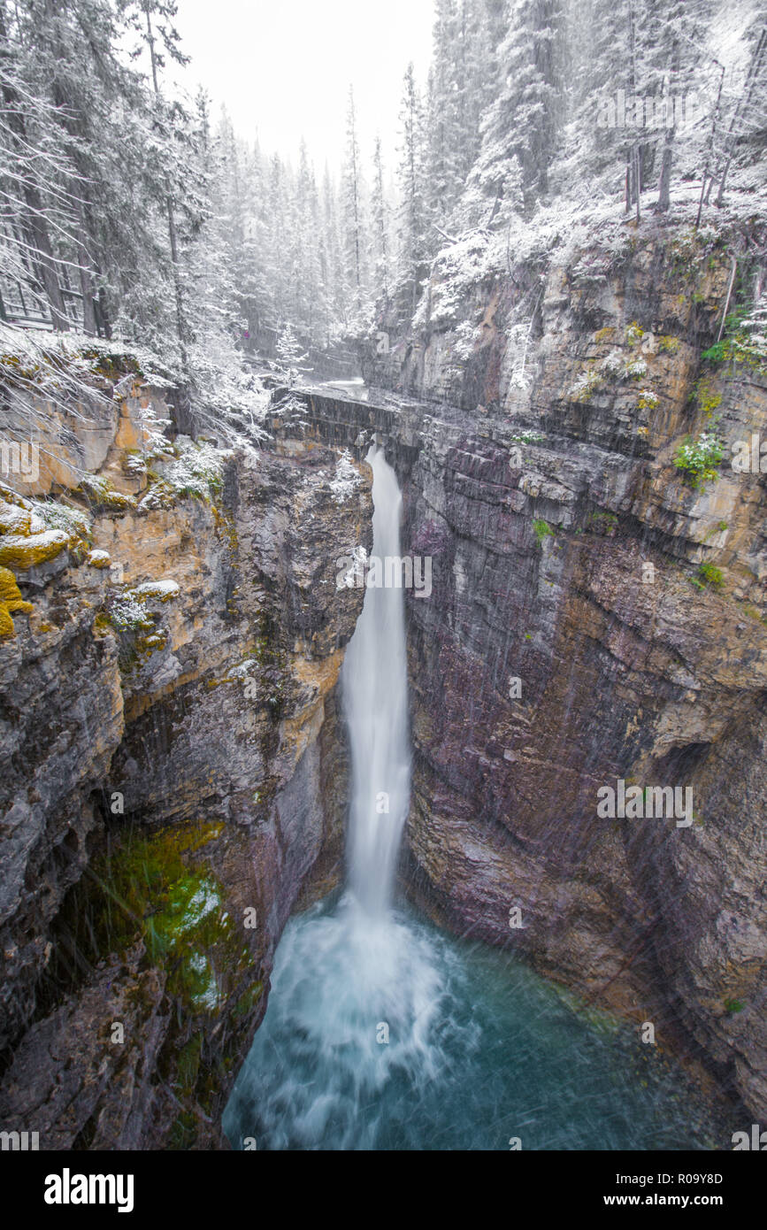 Waterfall in snowy day Stock Photo - Alamy