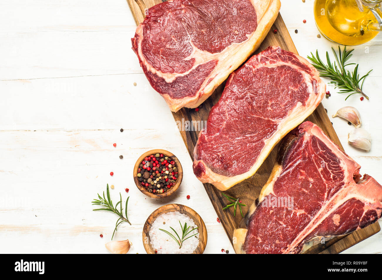 Raw meat beef steak. Black angus prime meat set - ribeye, striploin, t ...