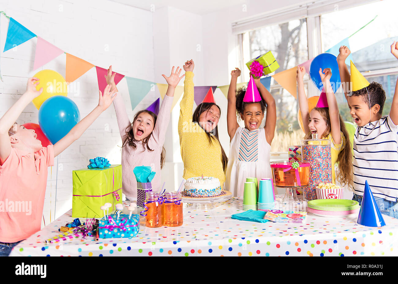 A group of children at birthday party at home Stock Photo - Alamy