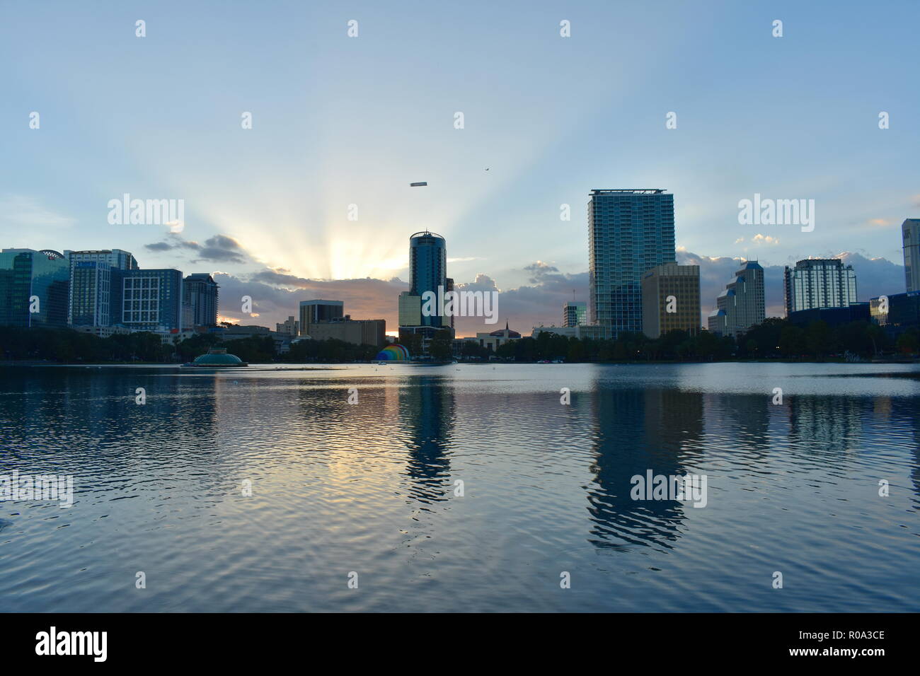 Orlando, Florida. October 19, 2018 Sunset with sunbeams on the horizon ...