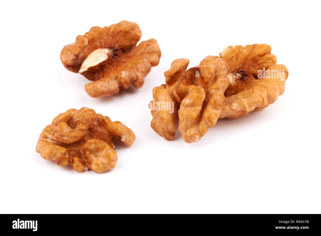 Fresh peeled walnuts isolated on a white background Stock Photo - Alamy