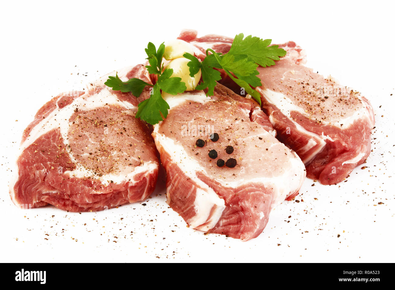 meat raw pork cutlet on a white background Stock Photo - Alamy