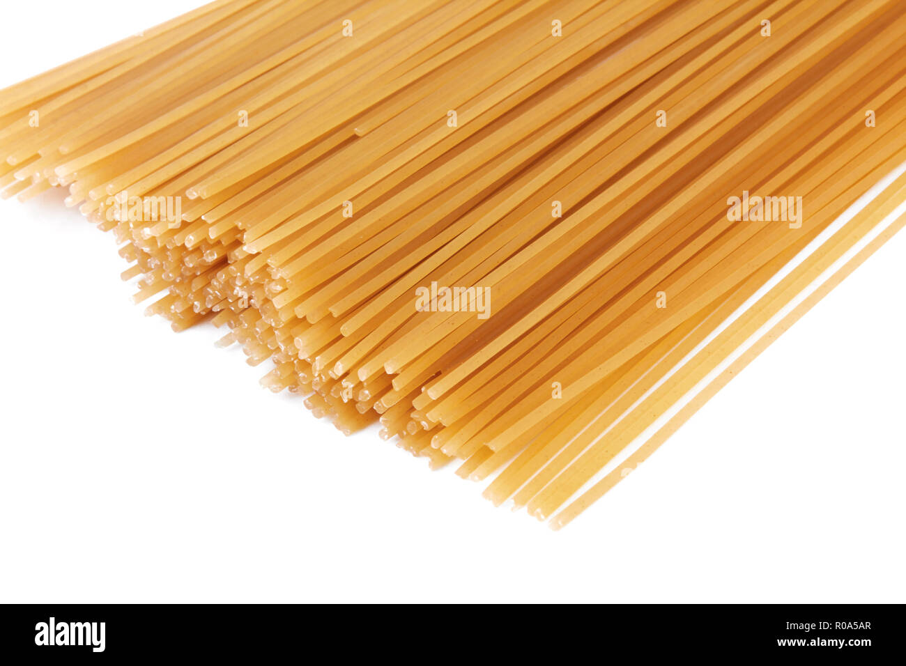raw spaghetti isolated on a white background Stock Photo - Alamy