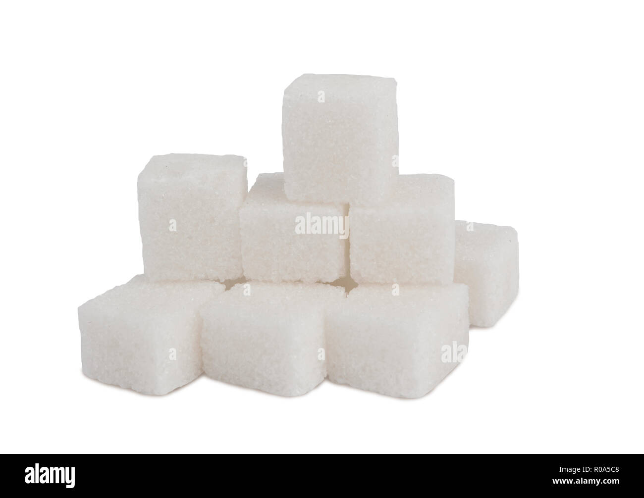 Pile of sugar lumps, isolated on a white background Stock Photo - Alamy