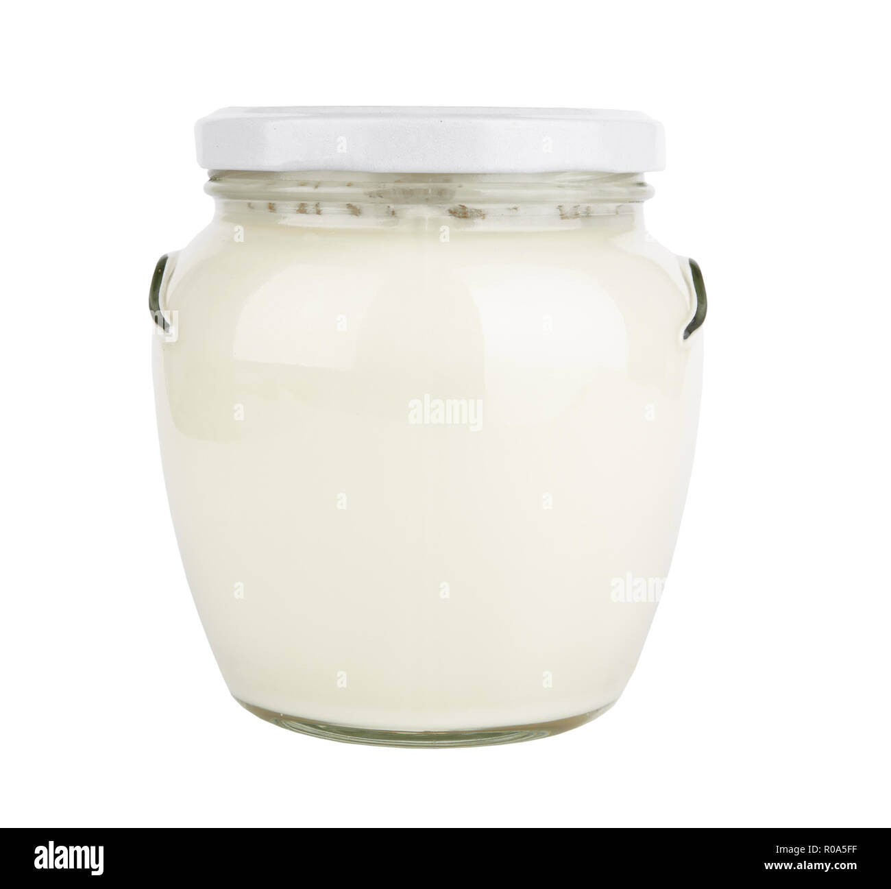 glass jar with a lid with liquid on a white background Stock Photo - Alamy