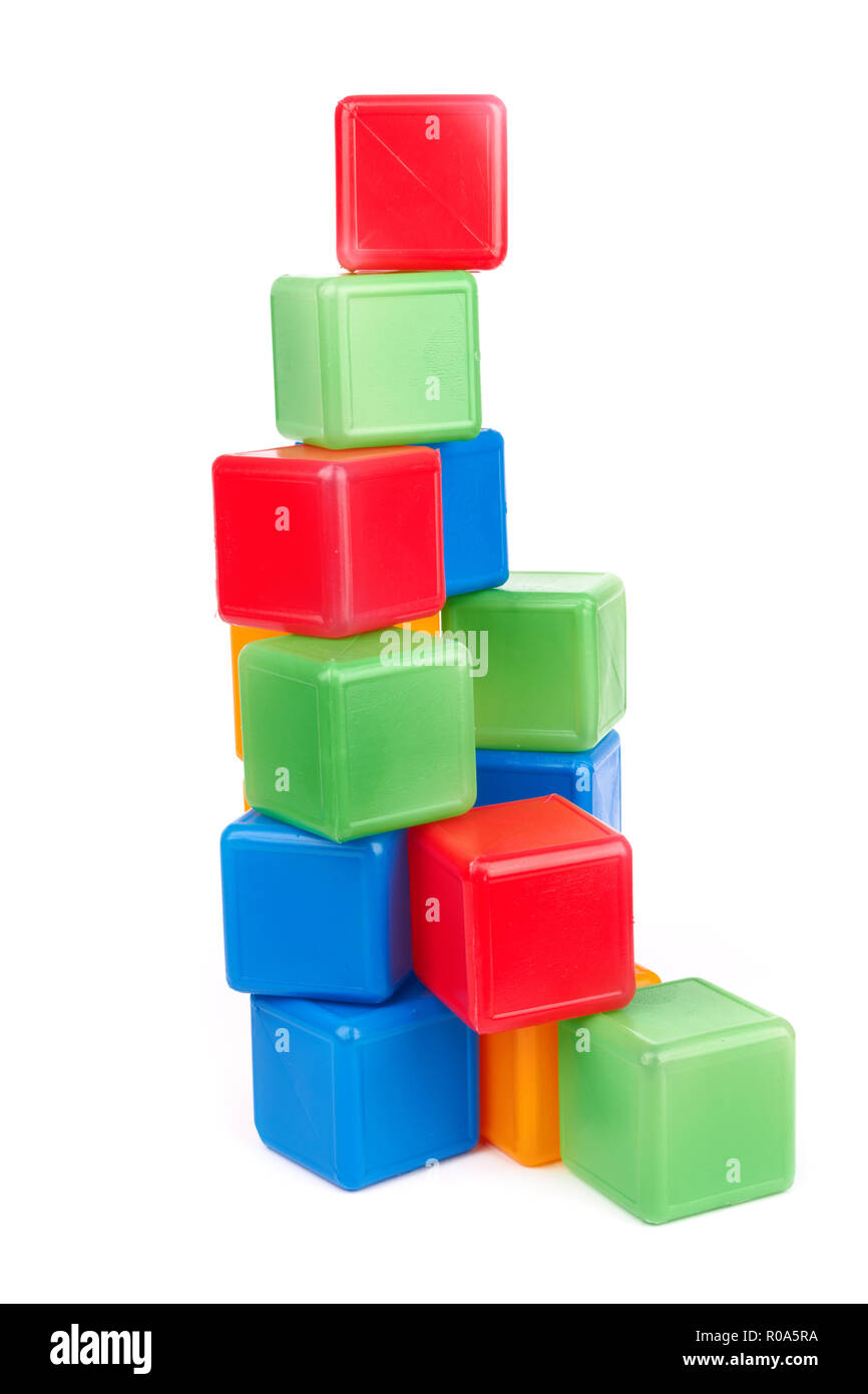 Plastic toy blocks on white background Stock Photo - Alamy