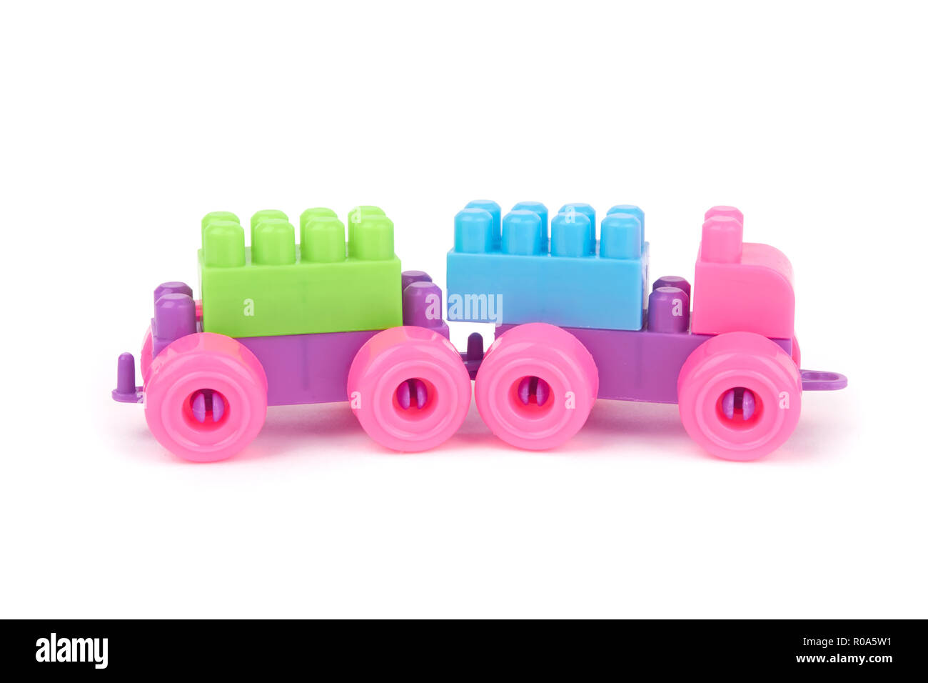 plastic building blocks train on a white background Stock Photo - Alamy