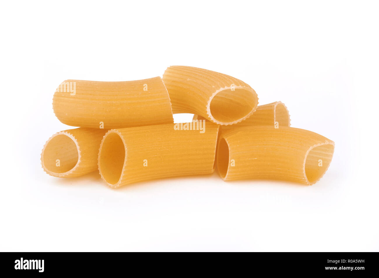 raw pasta isolated on white background Stock Photo - Alamy