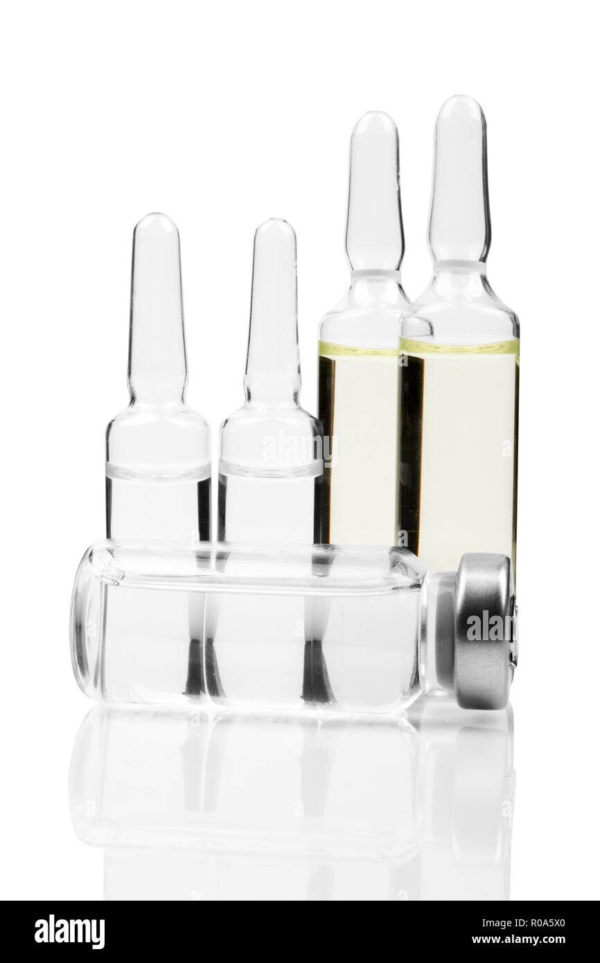 different ampules isolated on a white background Stock Photo - Alamy