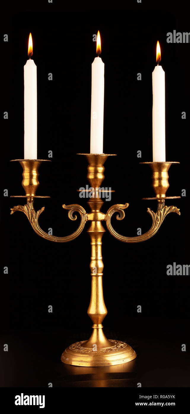 Old-fashioned baroque elegant candlestick on a black background Stock ...