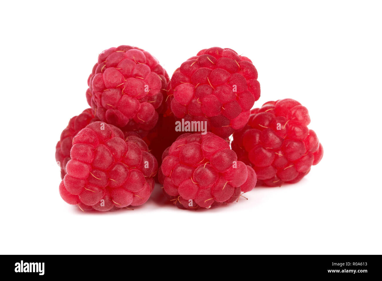Fresh raspberry fruit isolated over white background Stock Photo - Alamy