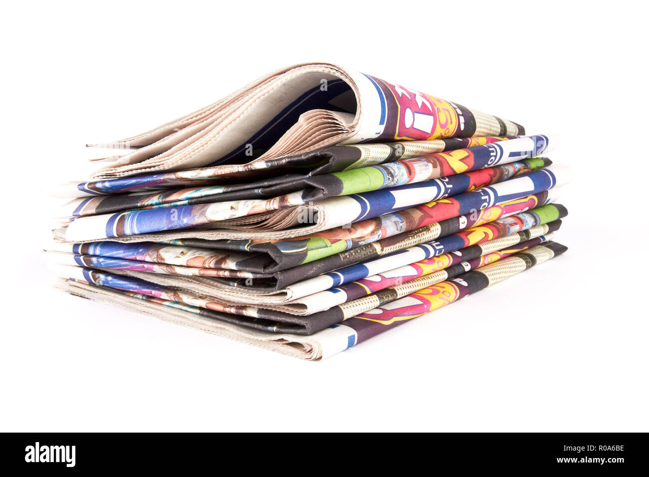 pack of newspapers on white background Stock Photo - Alamy