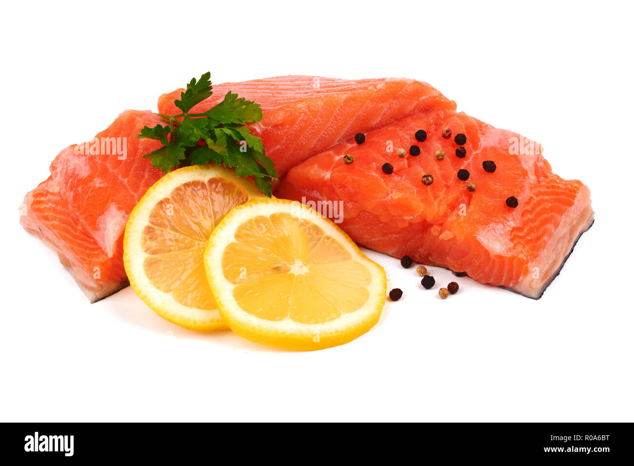 fresh uncooked red fish fillet over white Stock Photo - Alamy