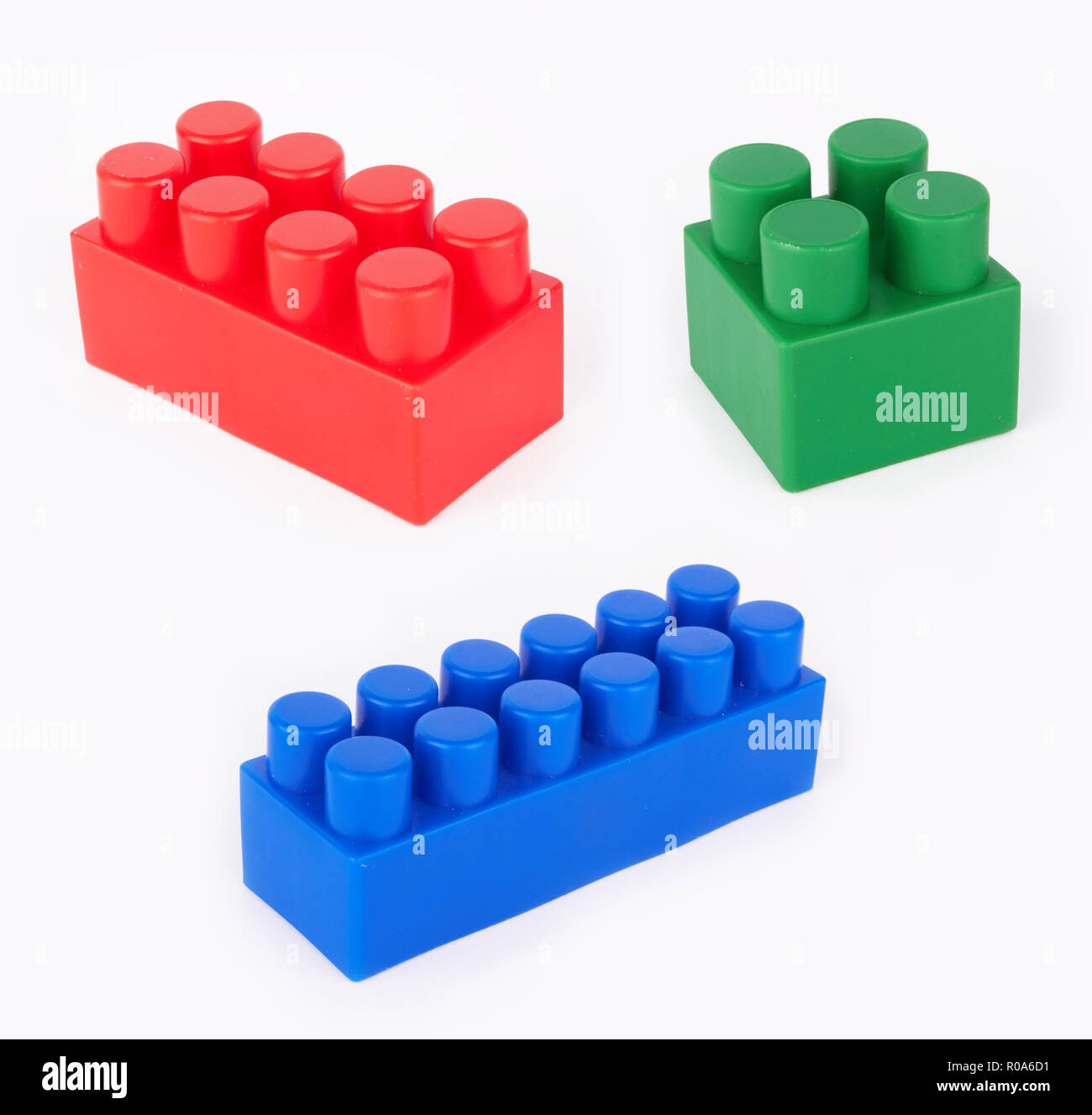 Plastic building blocks on white Stock Photo - Alamy
