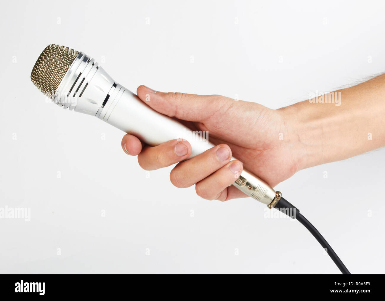 hand with a microphone on white Stock Photo - Alamy