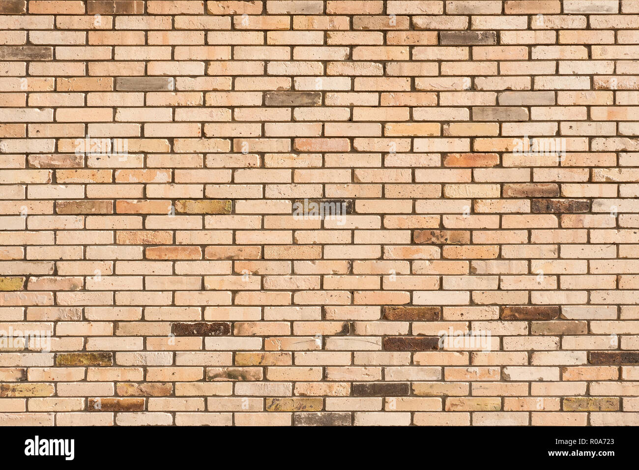 Faded brick wall background. Colored bricks facade Stock Photo - Alamy