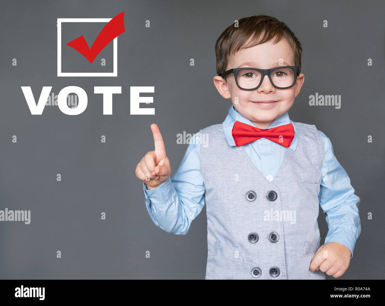 Cute Kid encouraging others to register and vote Stock Photo - Alamy