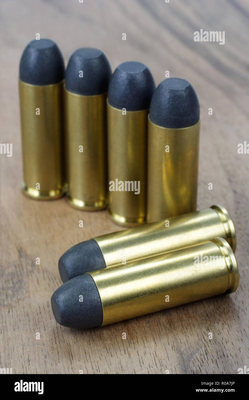 Black-powder revolver rounds .45 cal. dating to 1872 on wooden ...
