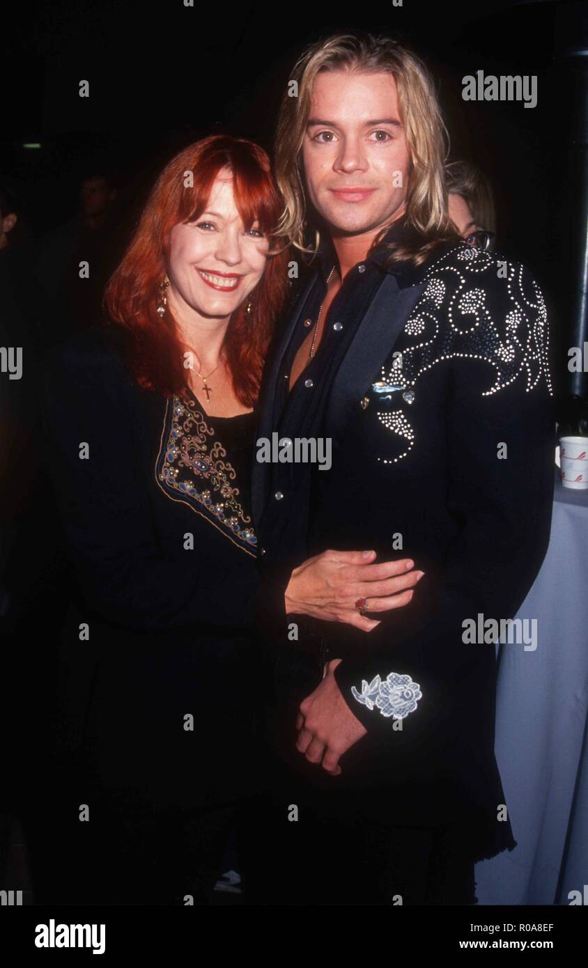 LOS ANGELES, CA - DECEMBER 3: (L-R) Pamela Des Barres and musician Jimmy Thrill Quill attend ...