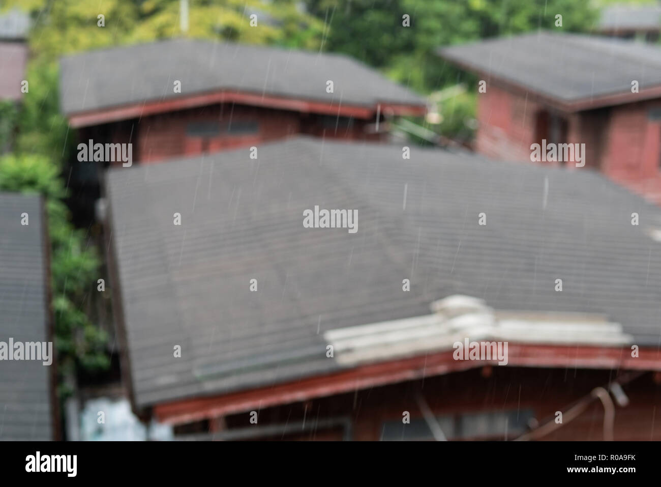 Heavy rain and houses Stock Photo - Alamy