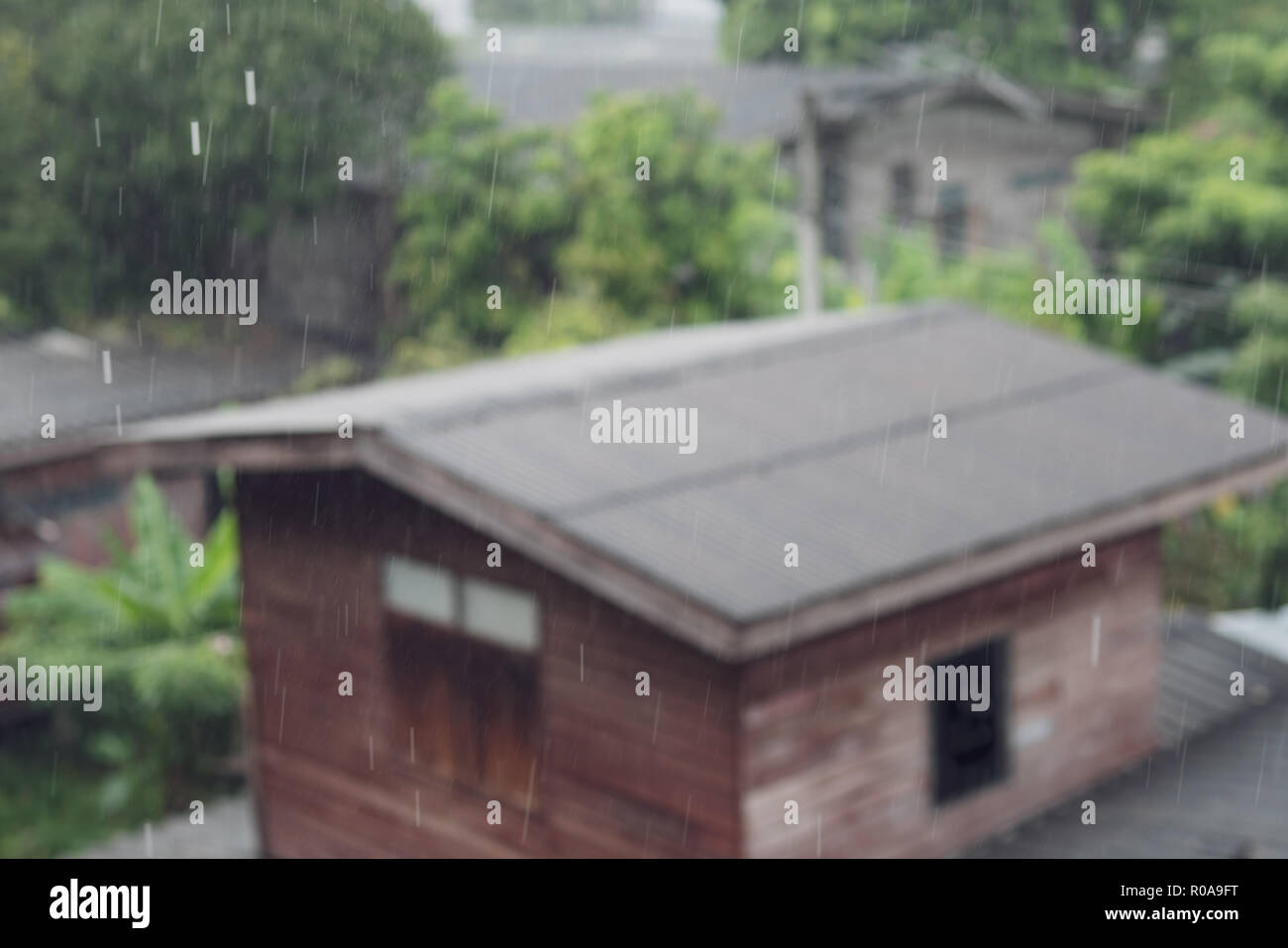 Heavy rain and houses Stock Photo - Alamy
