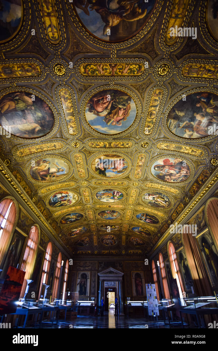 Long passageway with amazing ceiling leading to a door way Stock Photo ...