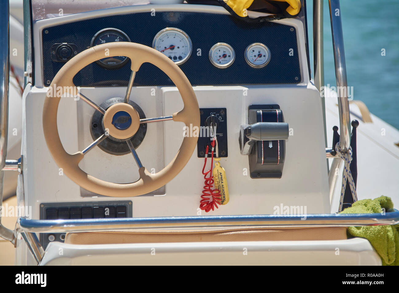 On-board instrumentation console with the helm and accelerator of a ...