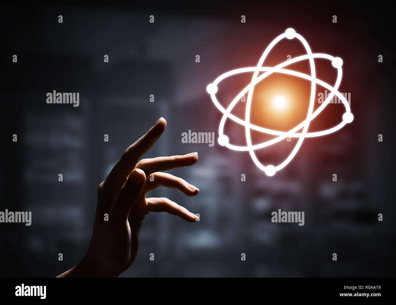 Science concept presented by atom symbol on dark interior background ...