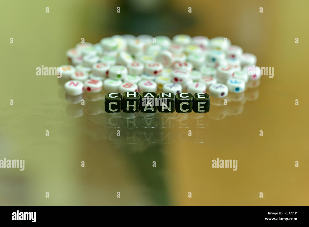 CHANCE written with Acrylic Black cube with white Alphabet Beads on the ...