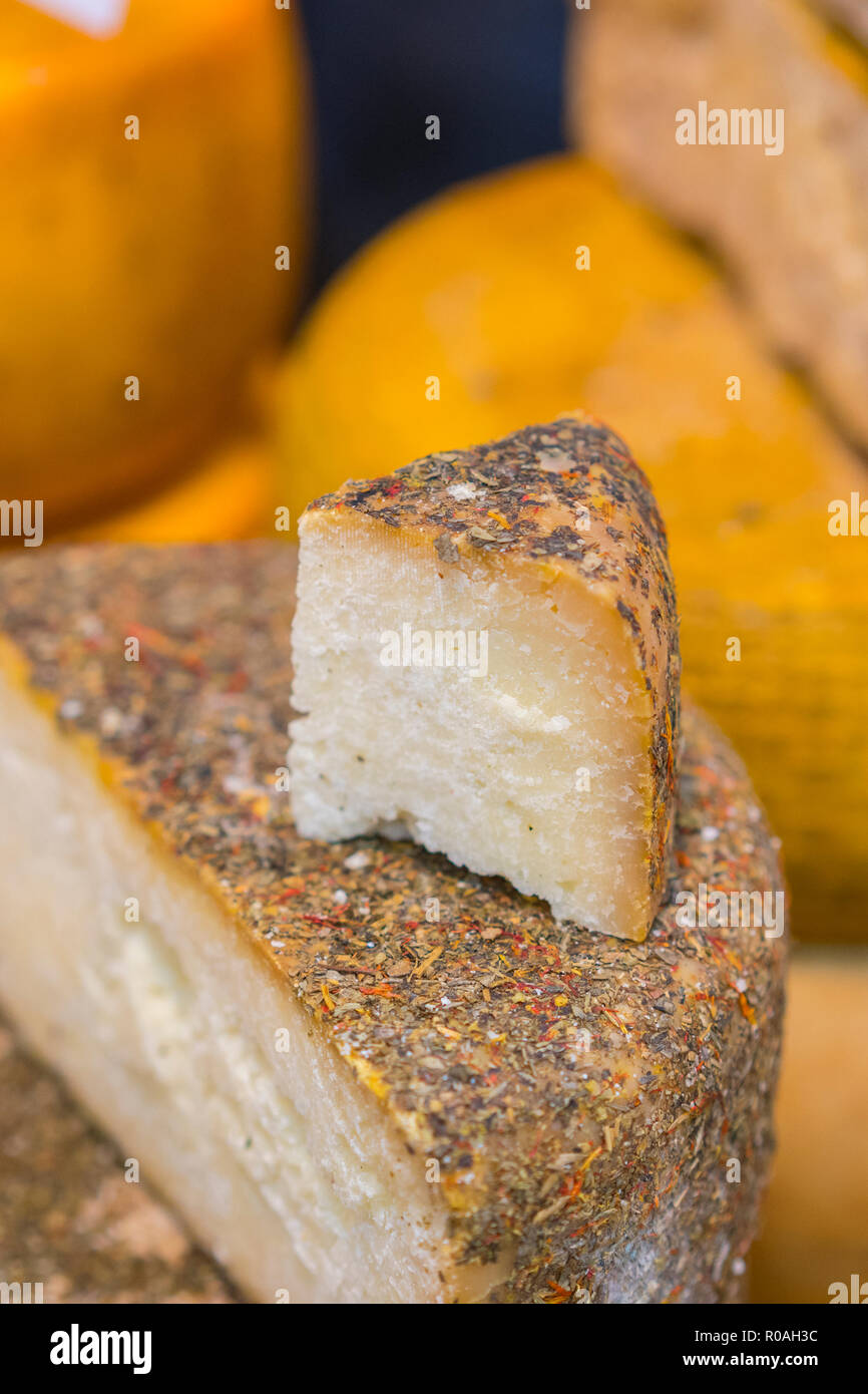 Craft cheese. Cheese head. Artisan cheese. vertical photo Stock Photo ...